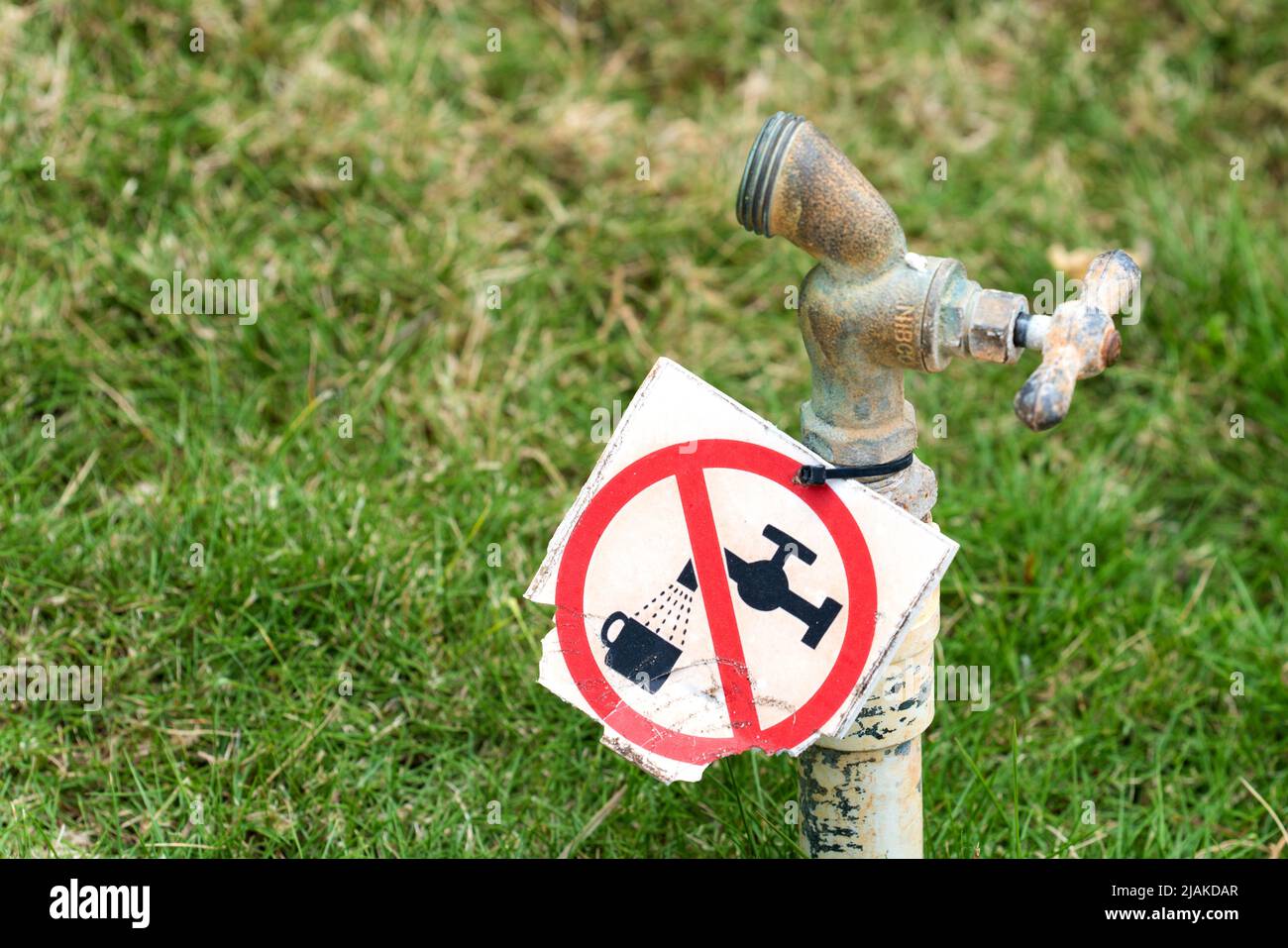 Faucet With A Pipe And A Sign Do Not Pour Water Do Not Drink Water faucet-with-a-pipe-and-a-sign-do-not-pour-water-do-not-drink-water