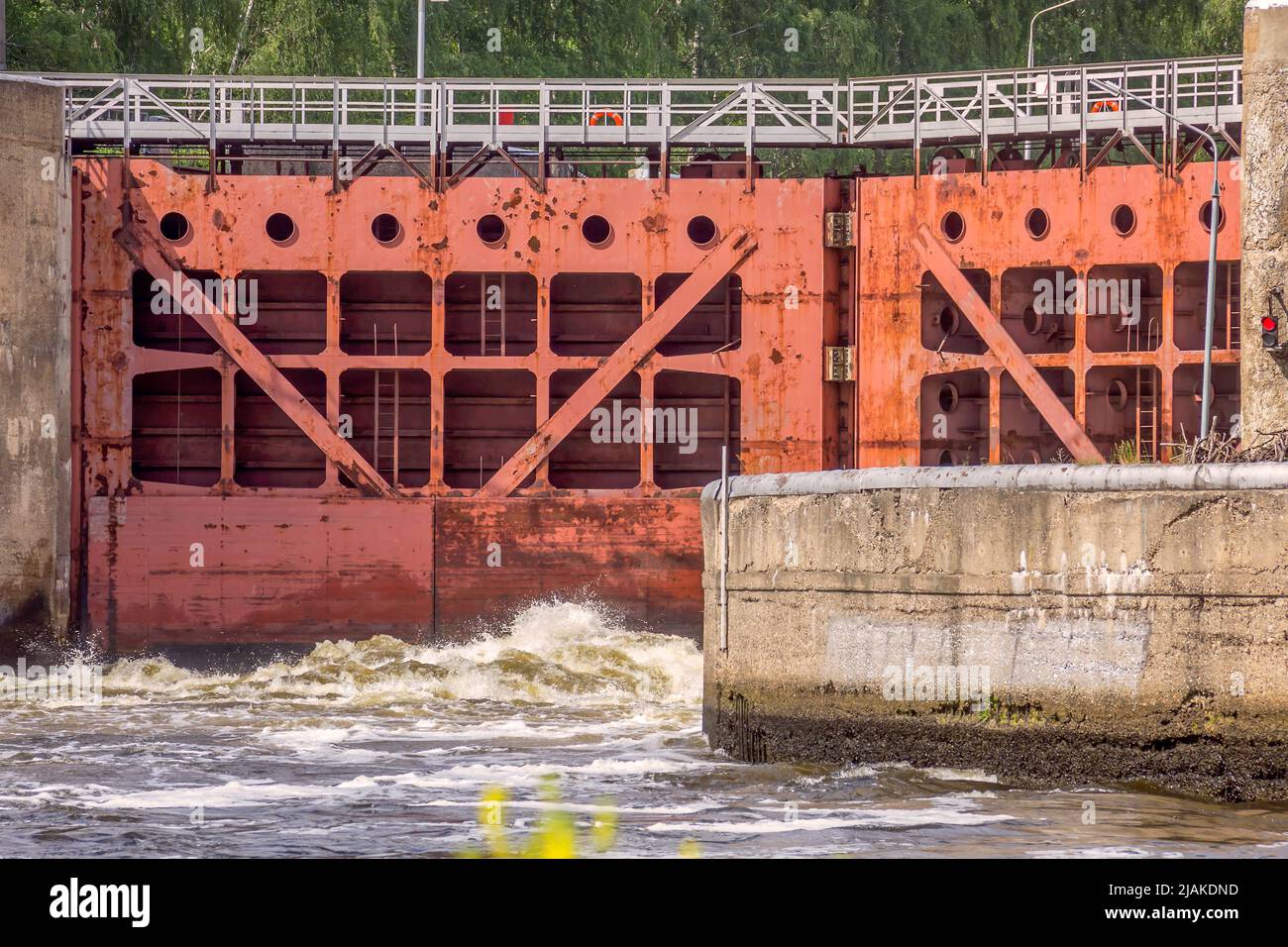 Water coming out from sluice gates Stock Photo - Alamy