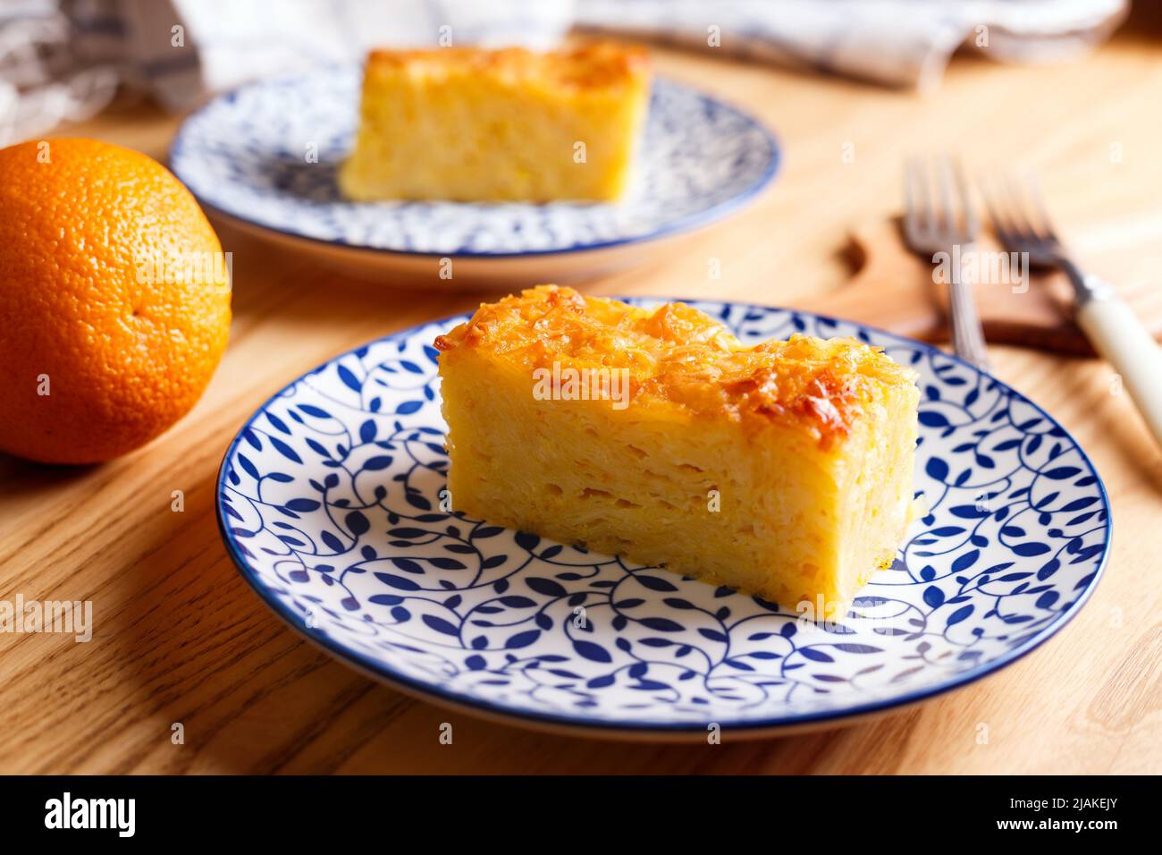 traditional greek orange pie on beautiful plates - Portokalopita Stock ...