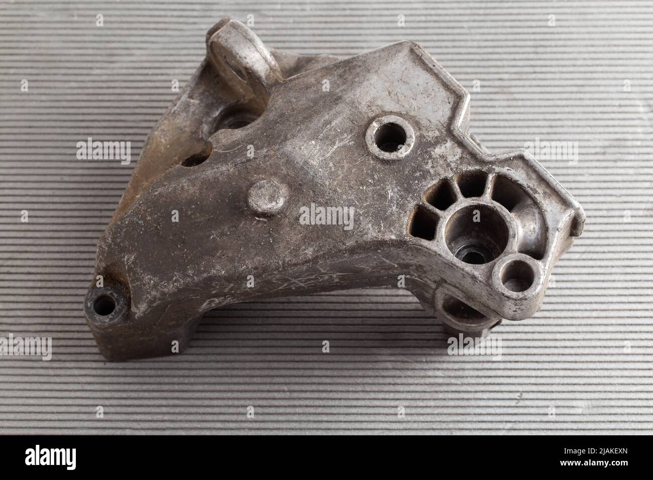 Aluminum pad and car engine mount Stock Photo - Alamy