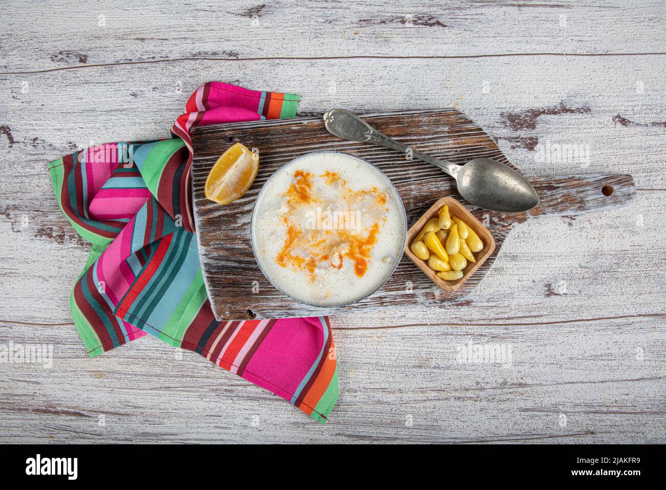 Turkish Traditional Tripe Soup with bread on white rustic wooden ...