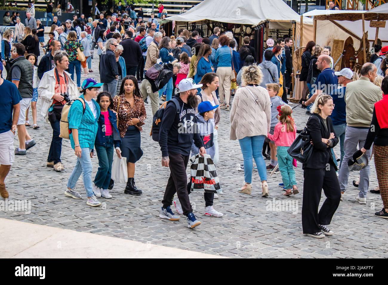 Reims, France - May 28, 2022 Visitors wandering the aisles of the ...