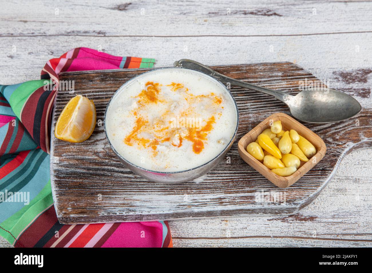 Turkish Traditional Tripe Soup with bread on white rustic wooden ...