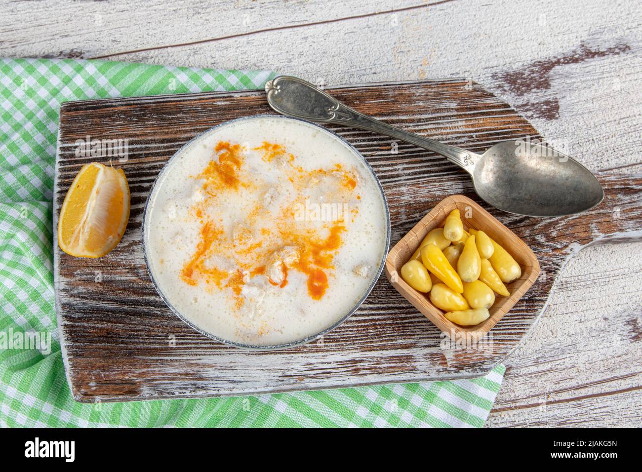 Turkish Traditional Tripe Soup with bread on white rustic wooden ...