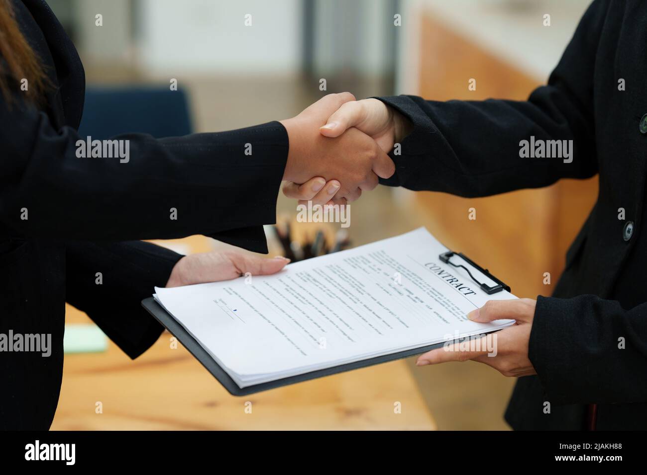 Real Estate Agent explain insurance and agreement contract to client ...