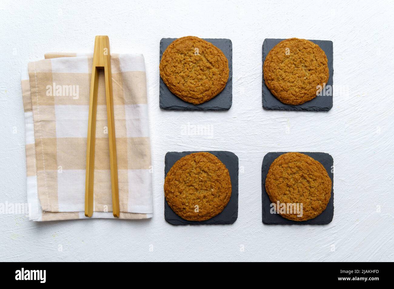 Healthy oatmeal cookies, baking and eating concept. Making craft ...