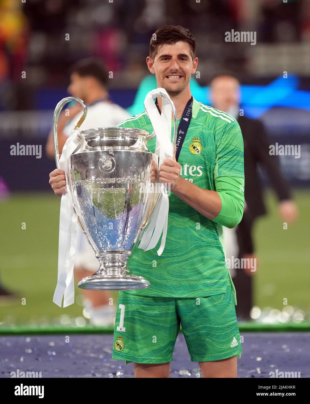 Real Madrid goalkeeper Thibaut Courtois with the trophy after the UEFA ...