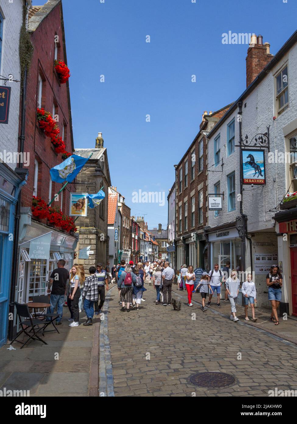 General view along Church Street in Whitby, North Yorkshire, England ...