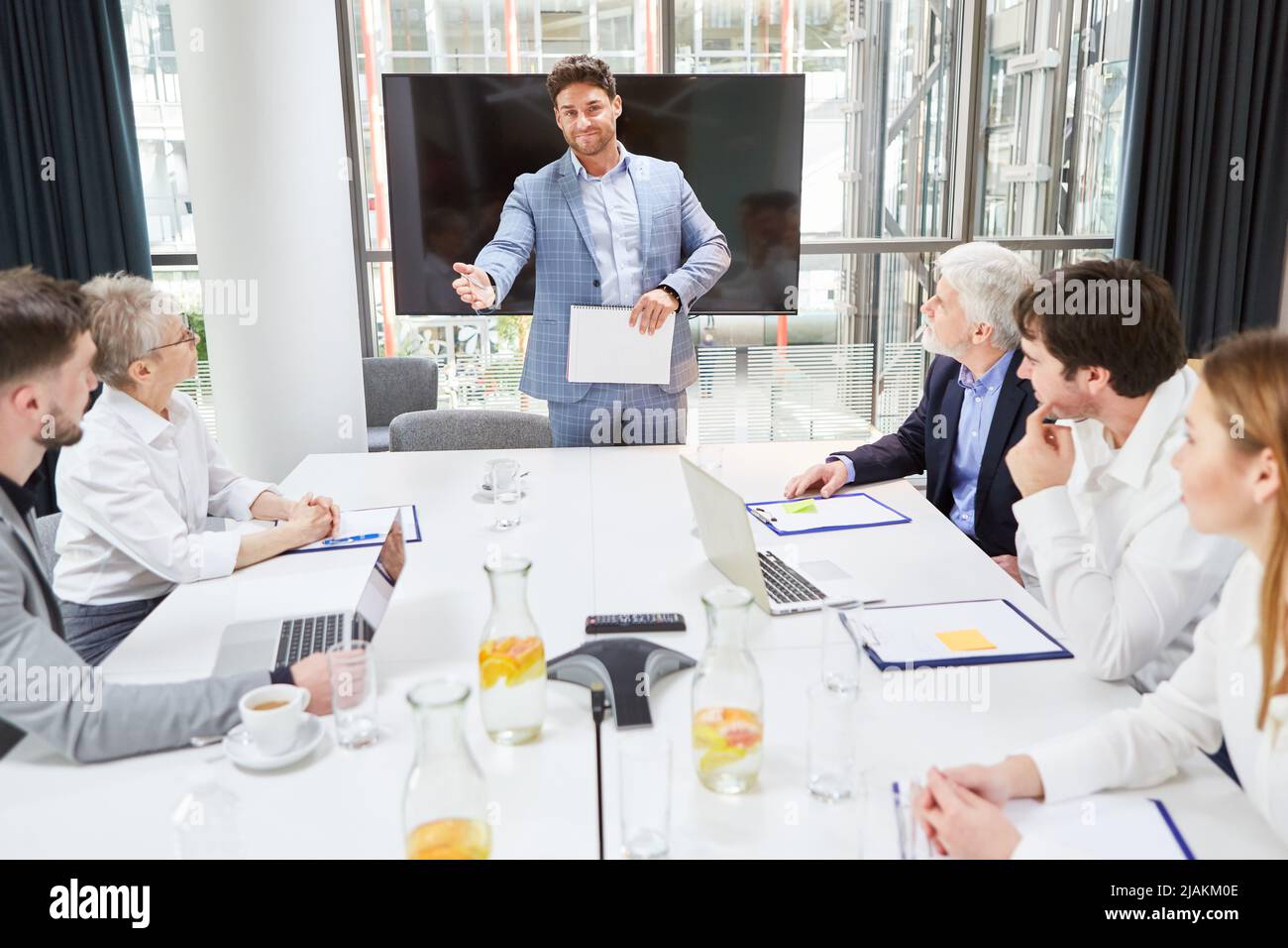 Businessman as a consultant giving a presentation in the consulting ...