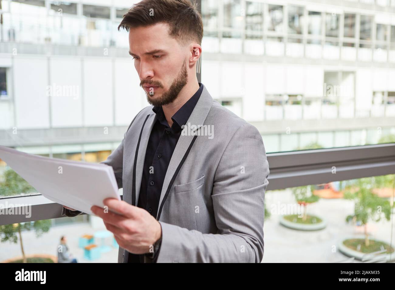 Examines documents hi-res stock photography and images - Alamy