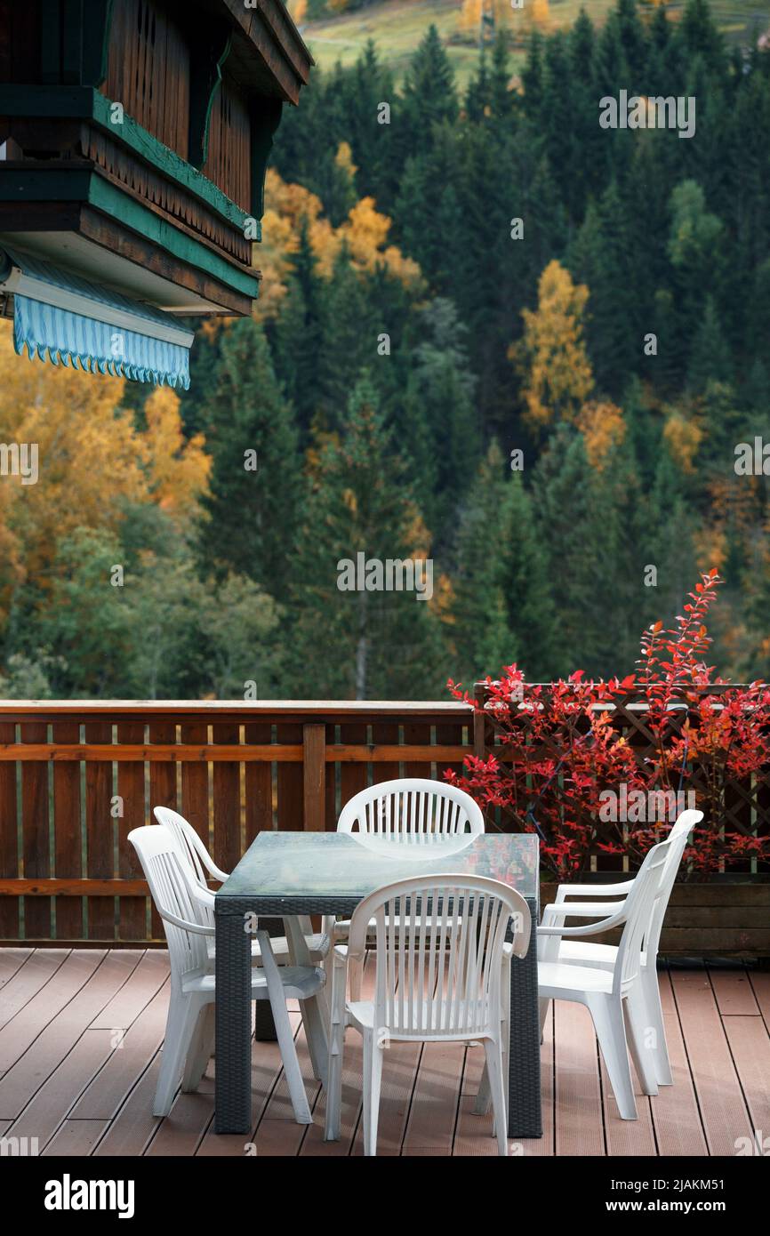 cozy terrace with a table and chairs in the mountains Stock Photo - Alamy