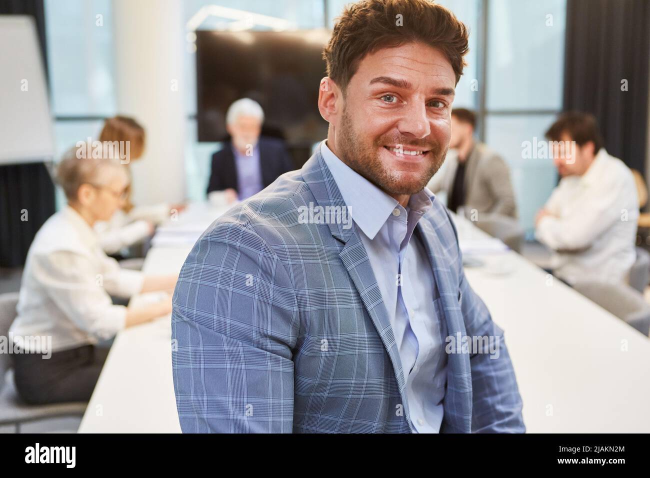 Successful business man as a manager or start-up founder in the meeting ...