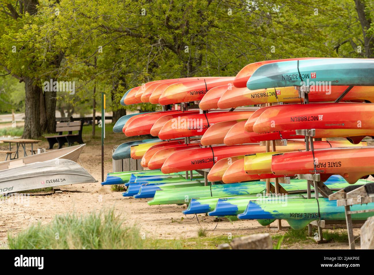 Ludington, MI - May 21, 2022: Colorful rental kayaks stored on a beach ...