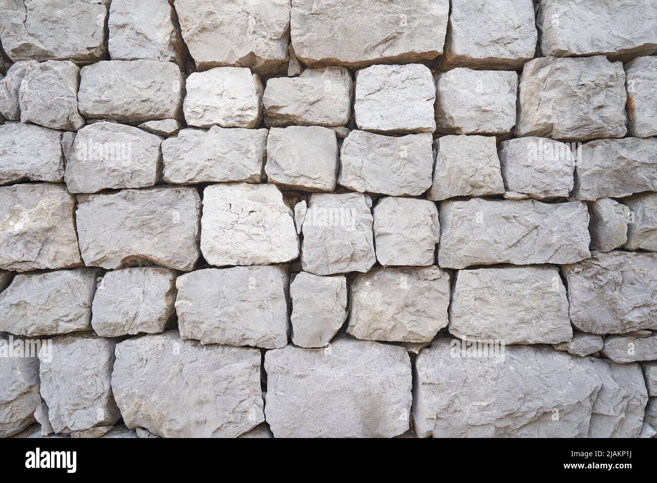 fence wall made of large rock stones Stock Photo - Alamy