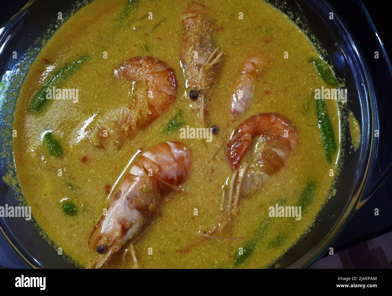 Curry dishes of giant fresh water prawn with french beans Stock Photo ...