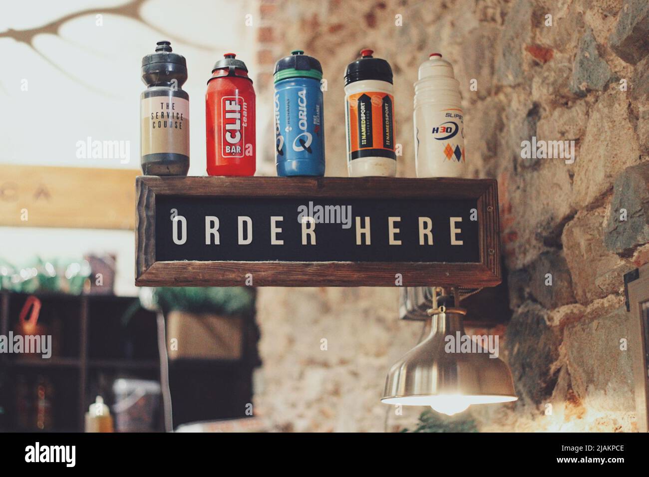 Order here sign in a cafe Stock Photo - Alamy