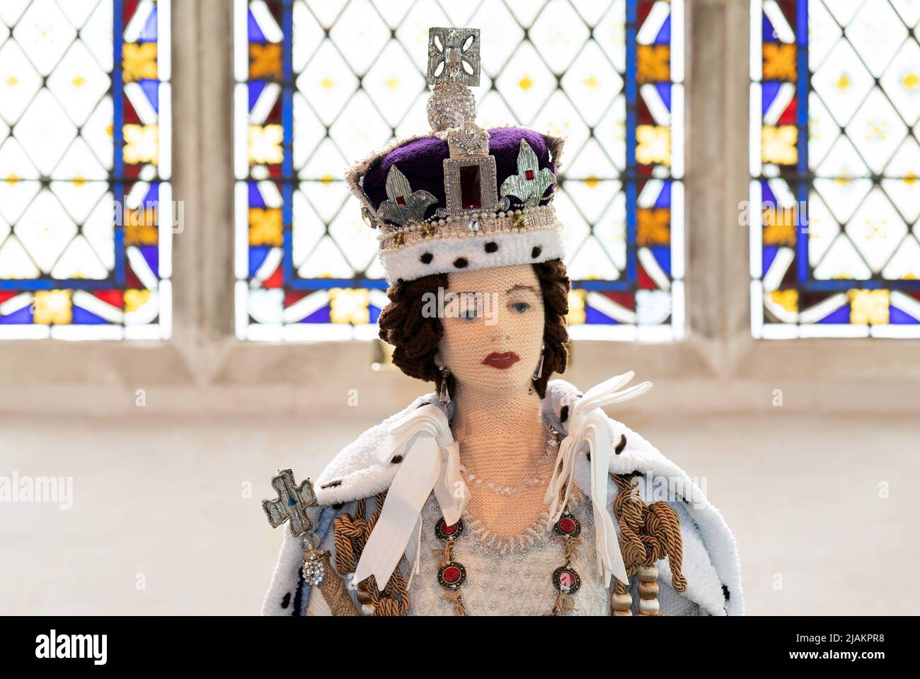 A life-size knitted model of Queen Elizabeth II at the Church of the ...