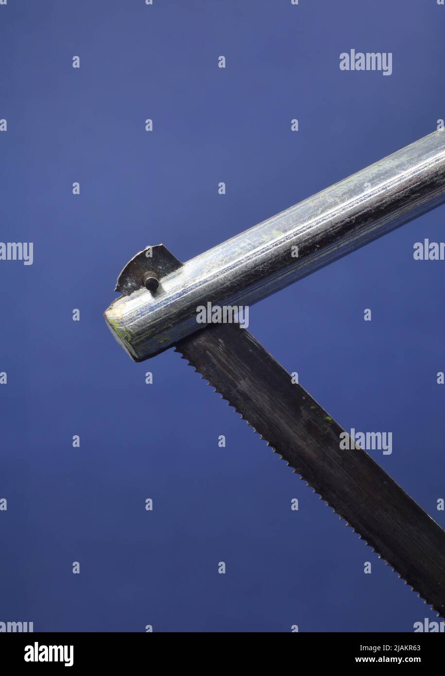small industrial objects close-up on a blue background Stock Photo - Alamy