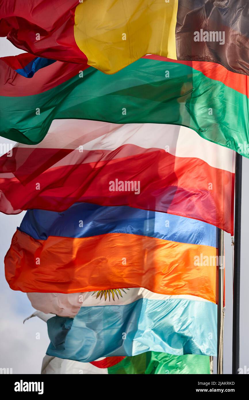 Flags of the word waving in the wind. Nation emblems Stock Photo - Alamy