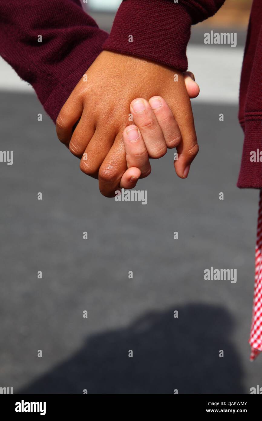 Teamwork hands children together hi-res stock photography and images ...
