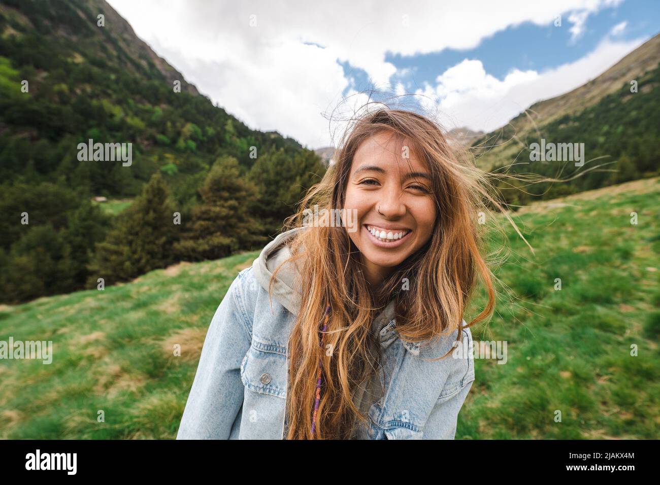 Latin young girl in the mountains of Andorra Stock Photo - Alamy