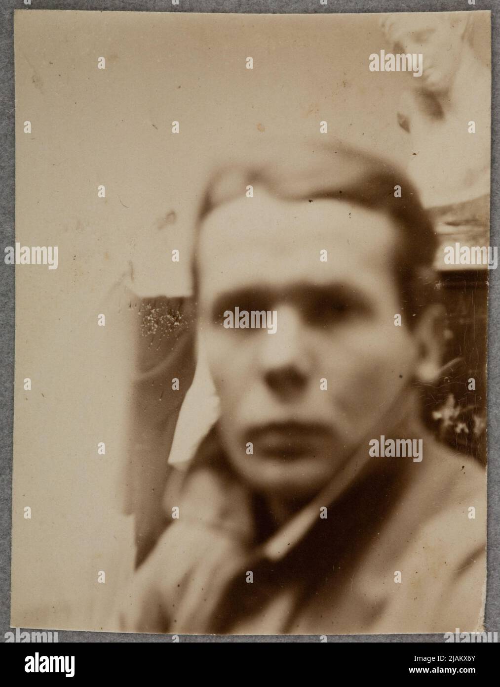 Male face in the background a portrait sculpture referring to the ...