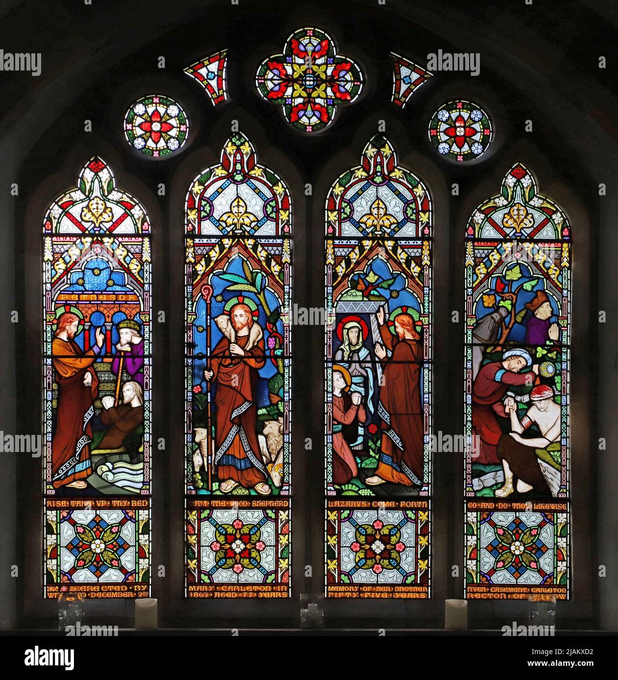 A stained glass window by Frederick Preedy depicting the Good Shepherd ...