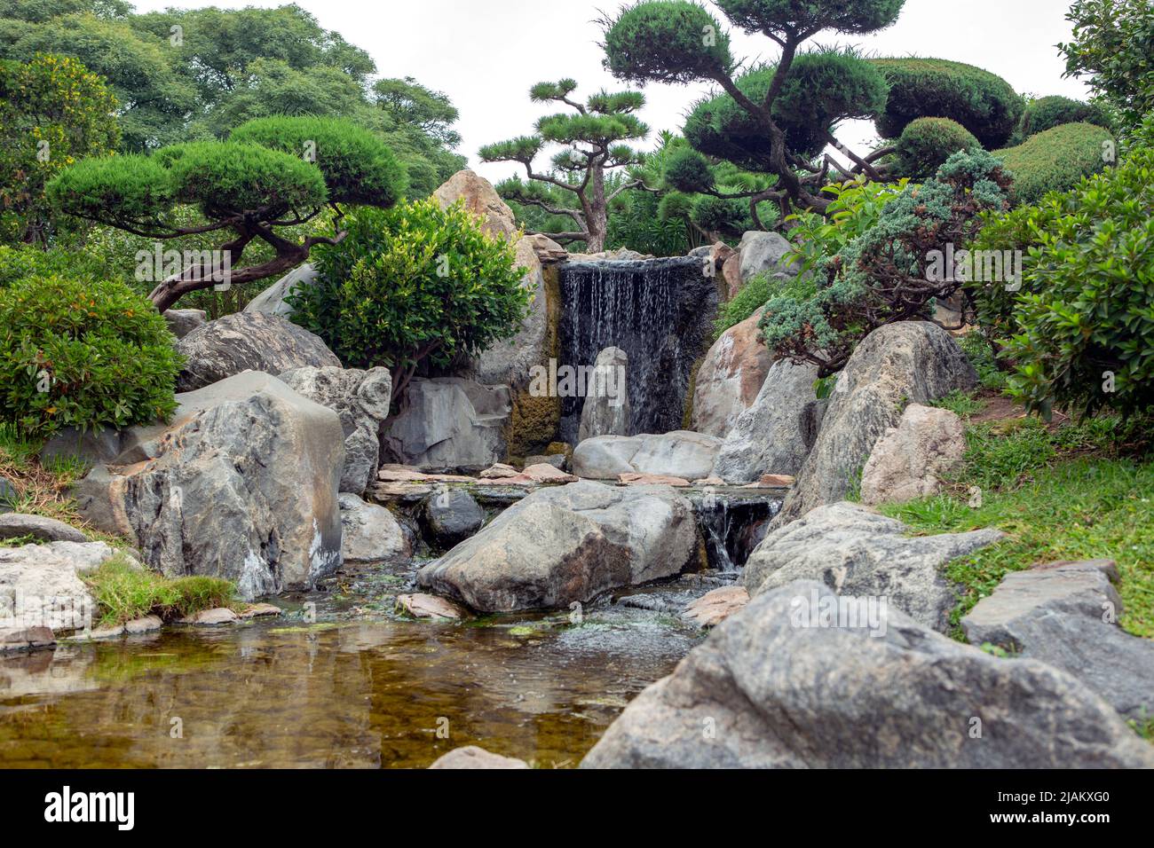 photograph of beautiful waterfall in japanese style park Stock Photo ...