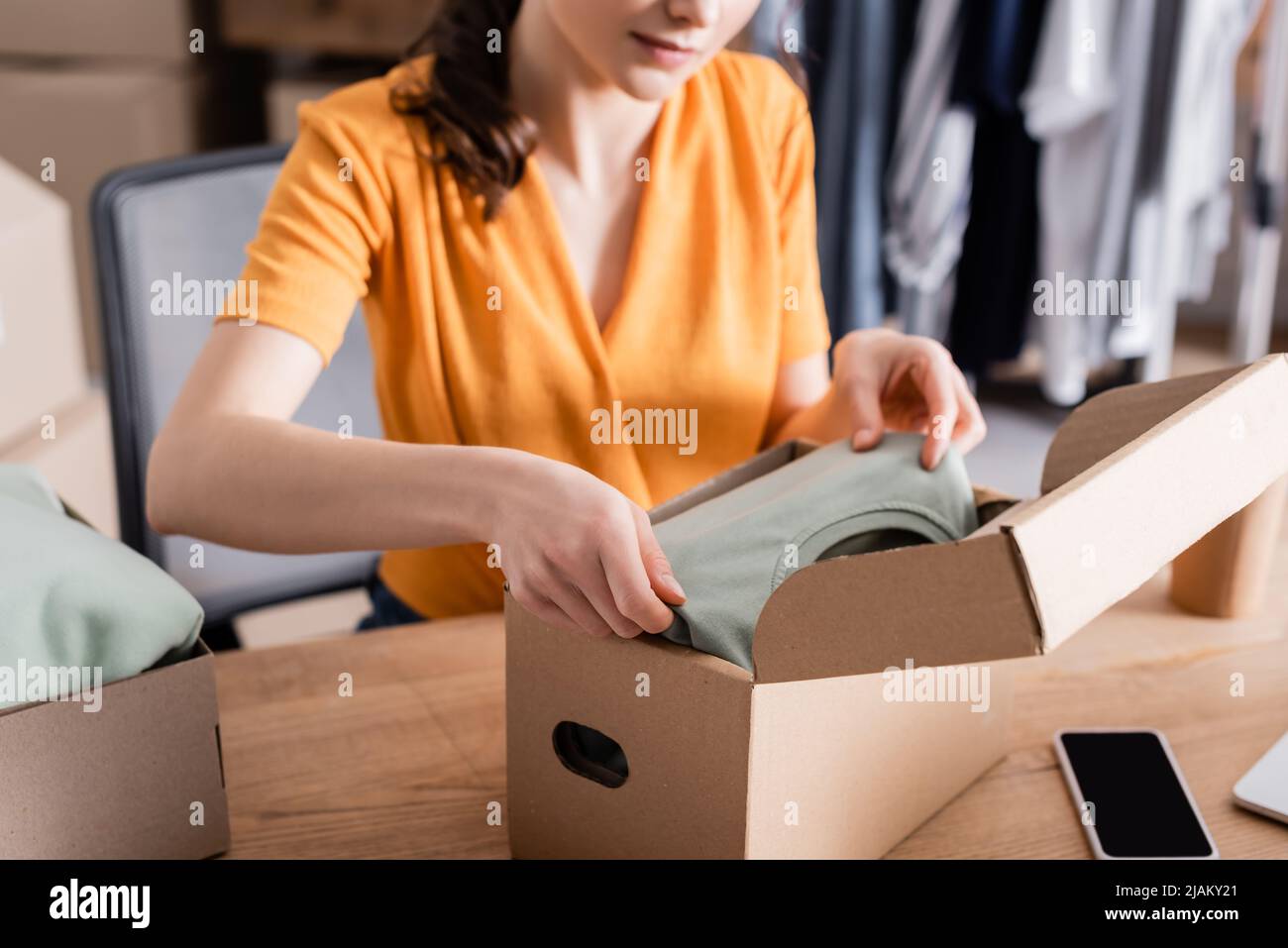 Delivery man putting carton boxes hi-res stock photography and images ...