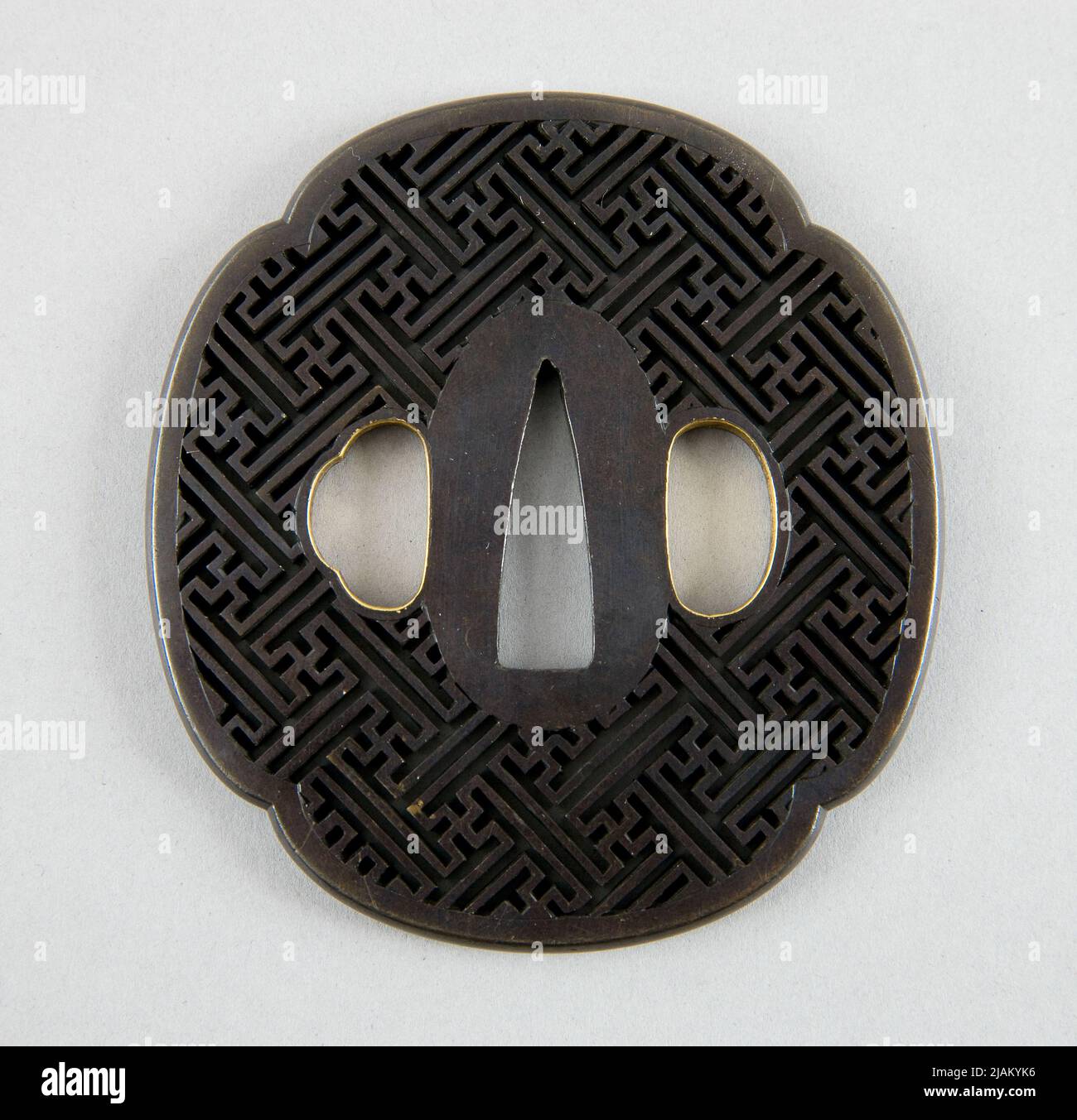 Tsuba the theme of the swastika and the meander unknown Stock Photo - Alamy