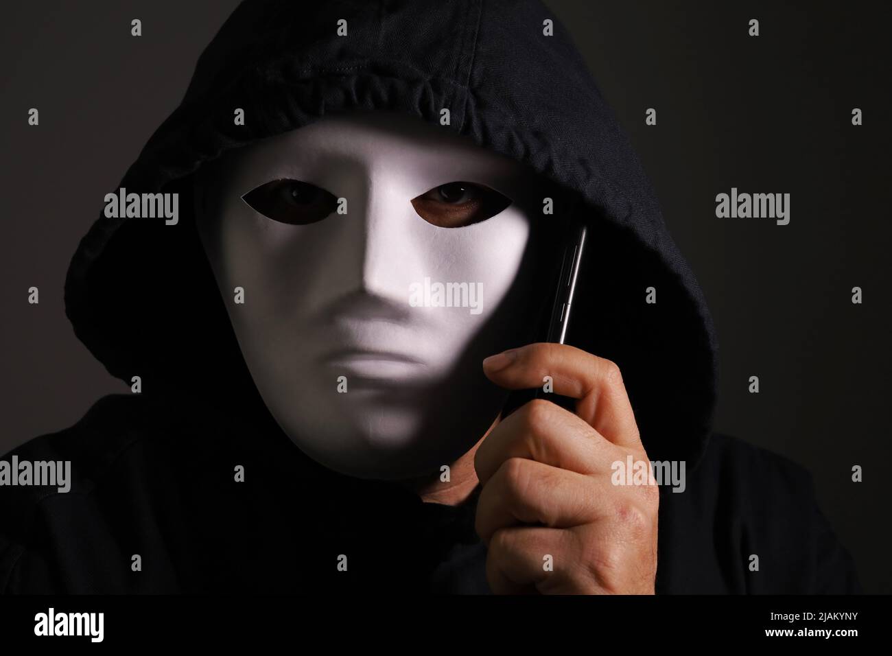 Masked man on computer hi-res stock photography and images - Alamy