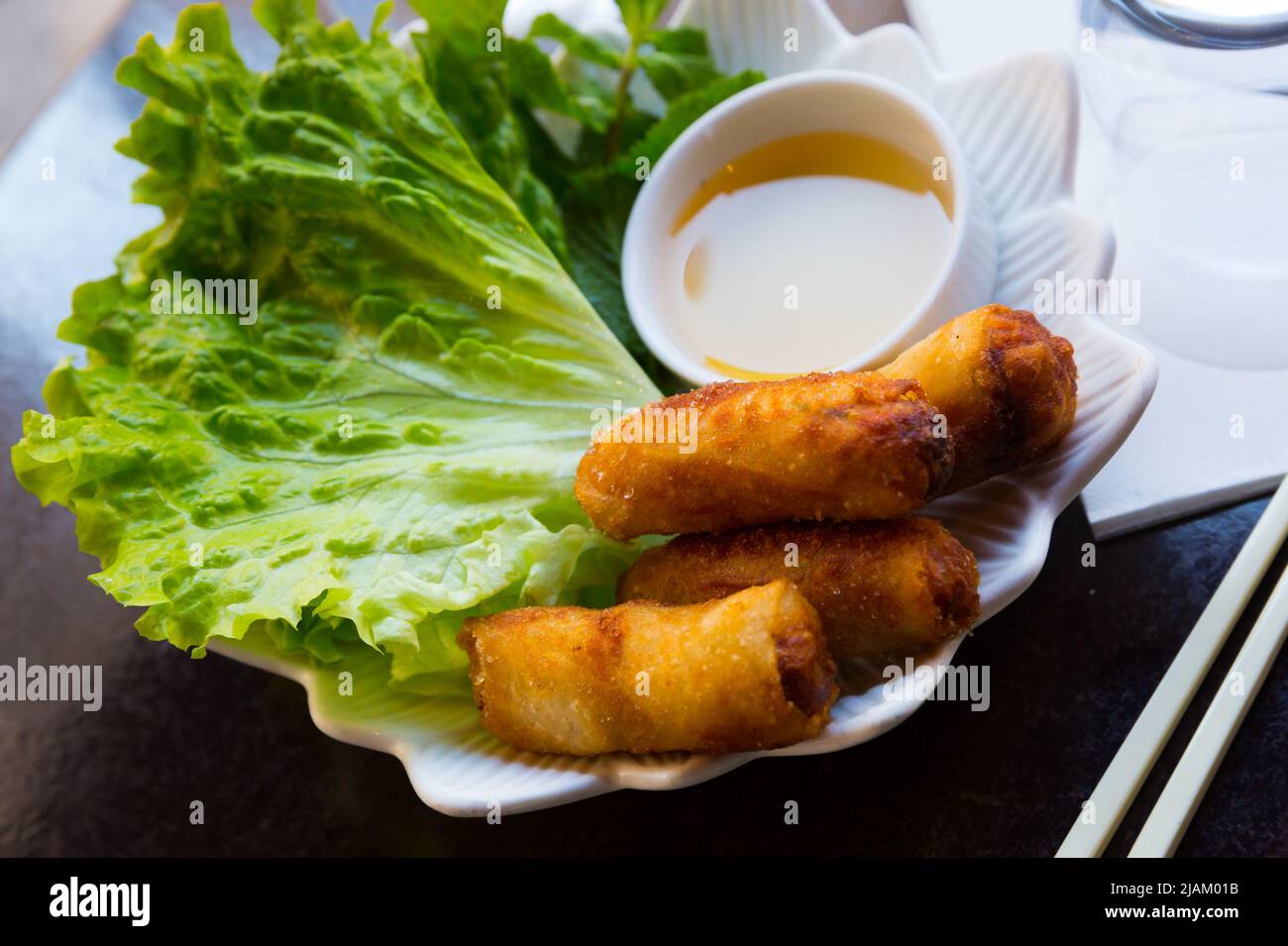 Nem rolls with lettuce and sauce Stock Photo - Alamy