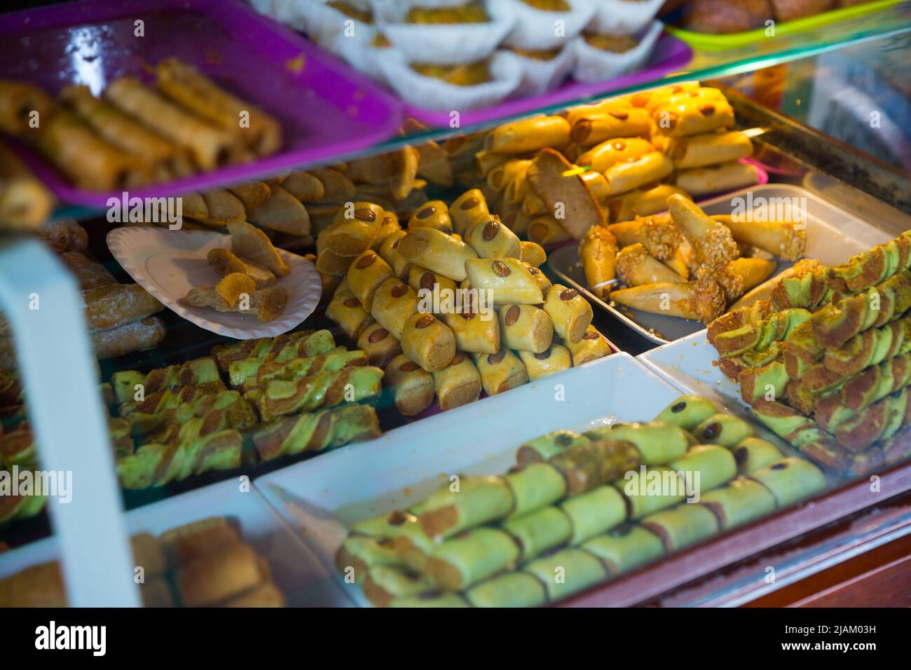 Counter with many oriental sweets Stock Photo - Alamy