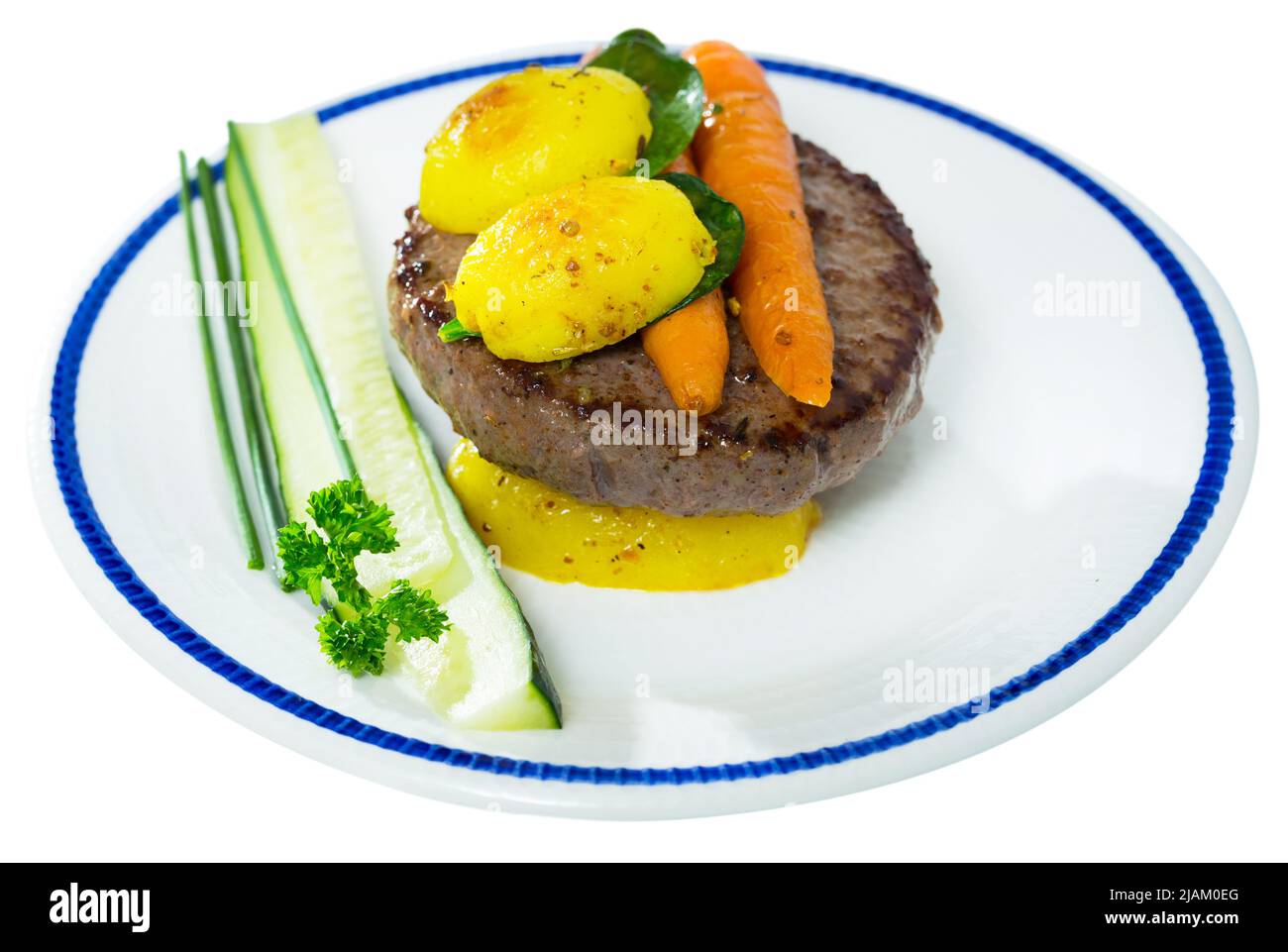 Beef patty with baked vegetables Stock Photo - Alamy
