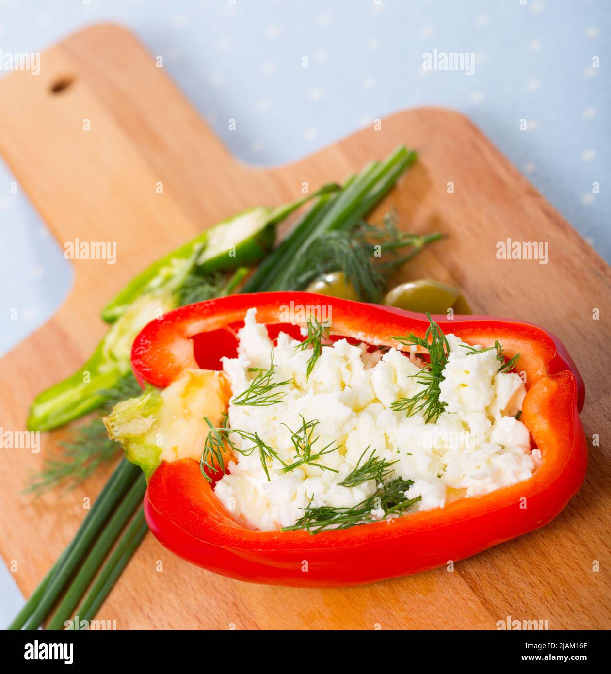 Bell pepper stuffed with brynza Stock Photo - Alamy