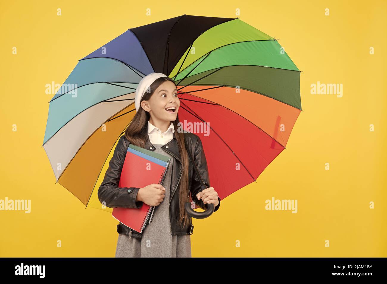 vivid rain protection. happy girl in glasses hold notebook. education ...