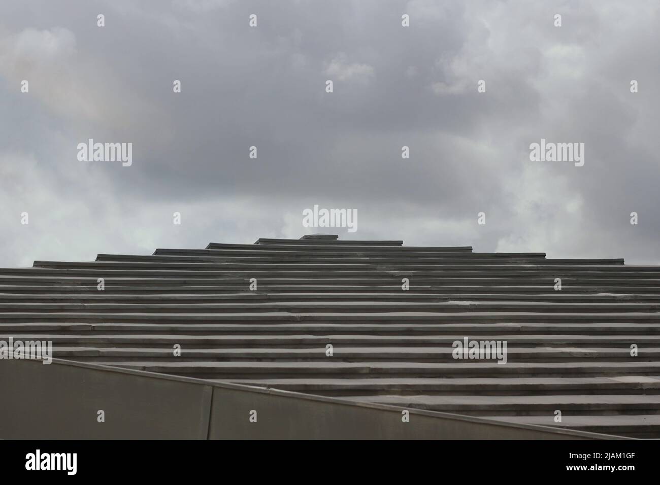 Simple layers of roofing forming a pyramid shape Stock Photo - Alamy