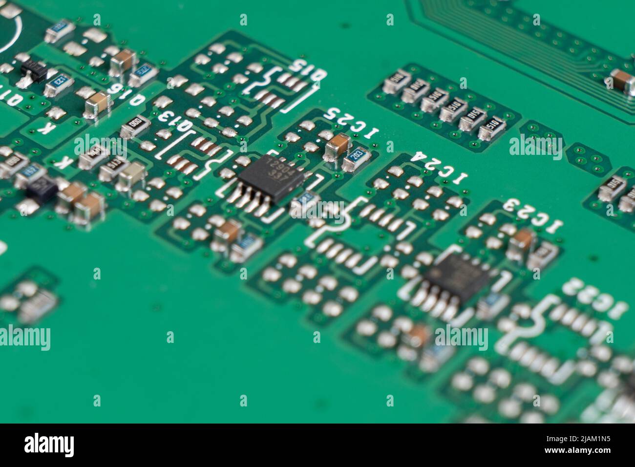 Macro shot of Circuit board with resistors microchips and electronic ...