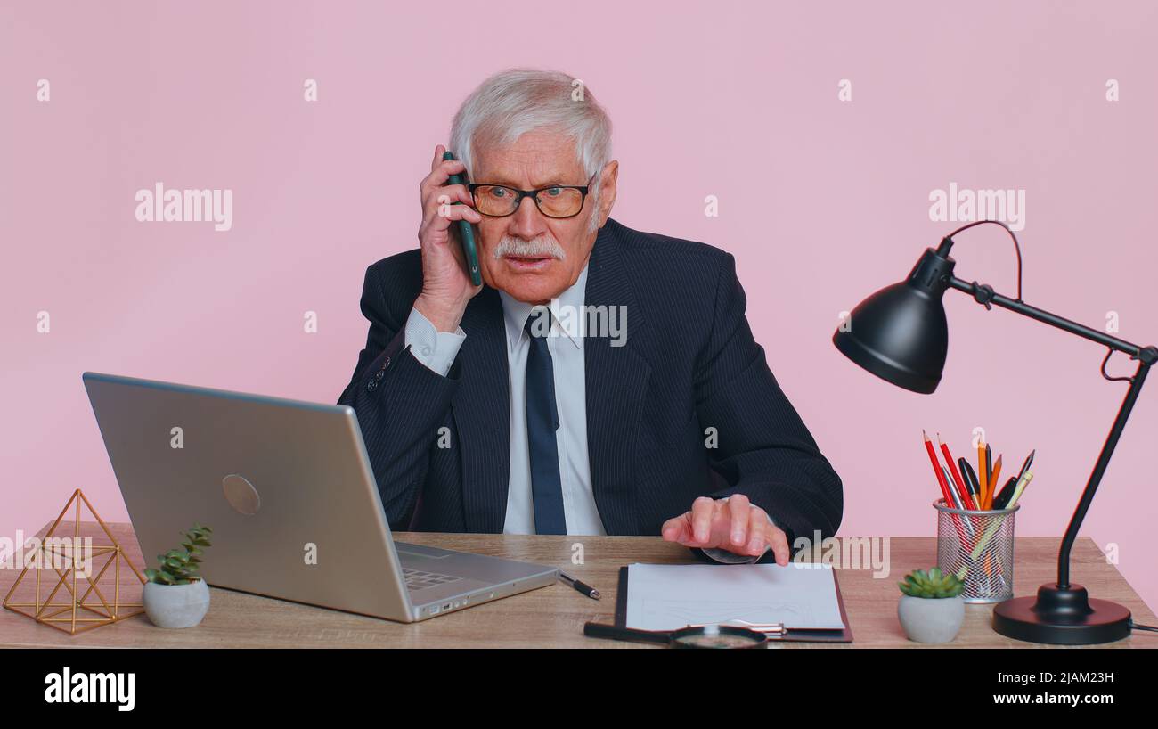 Mature man mad at laptop hi-res stock photography and images - Alamy