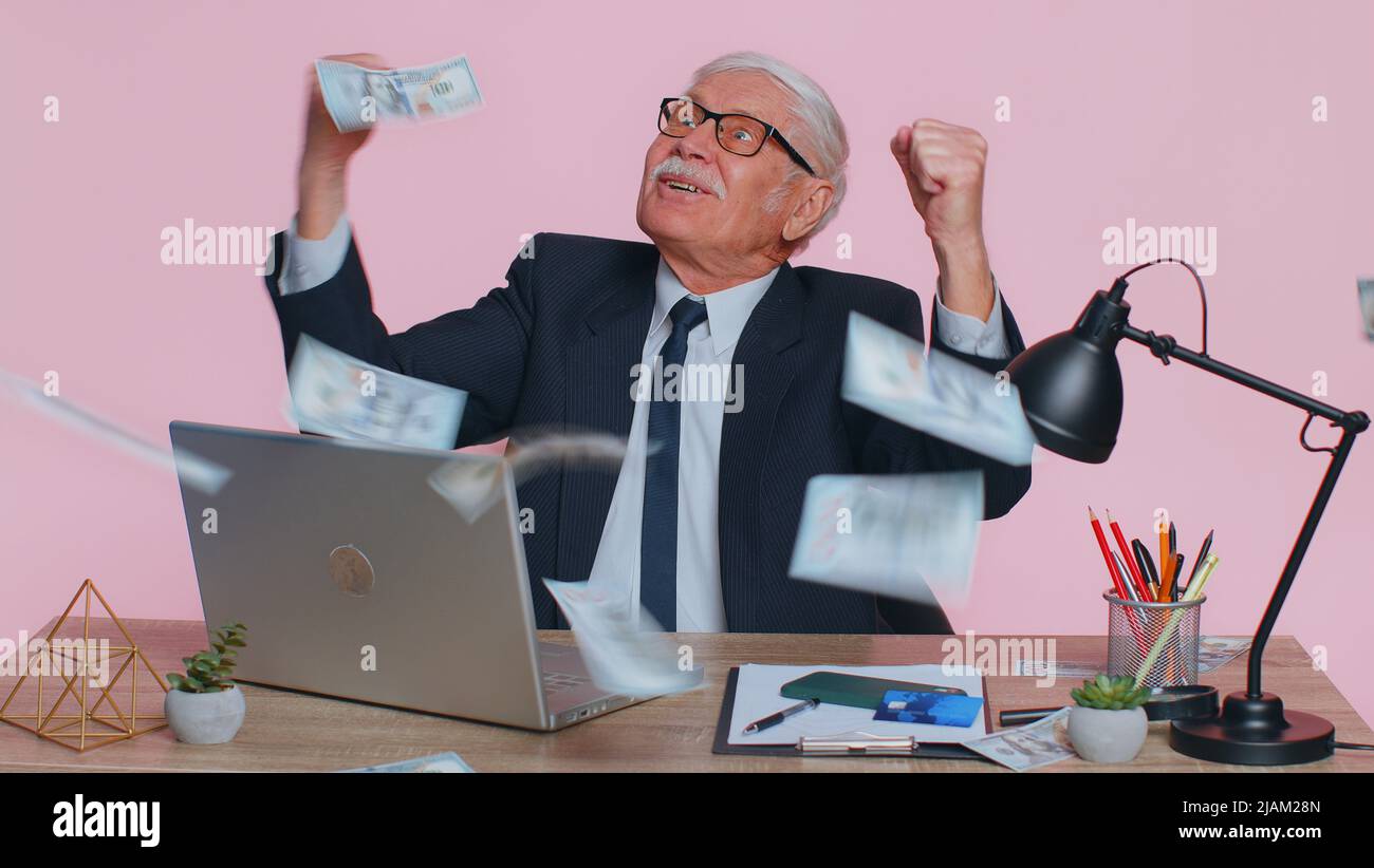 Senior rich business man dancing victory dance enjoying wealth. Lots of ...