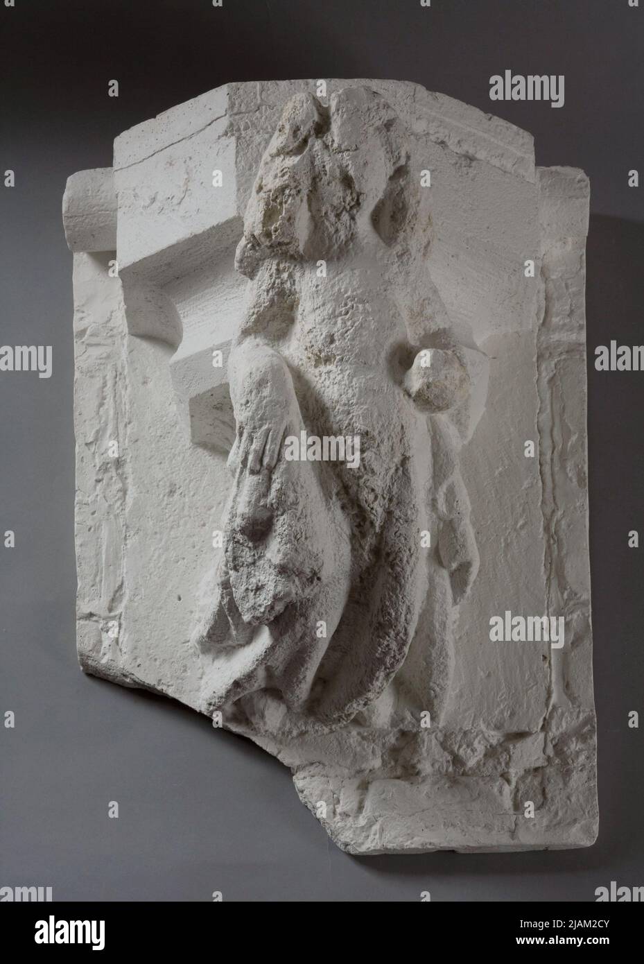 A woman in trailing robes with an unspecified object in her hand a ...