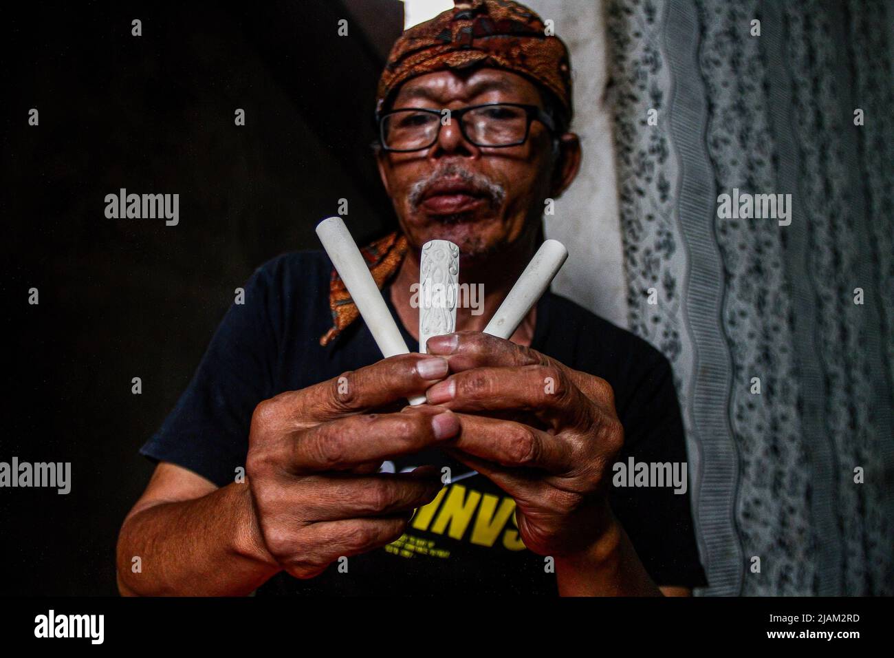 Cileunyi, Indonesia. 31st May, 2022. Idin shows handicrafts of ...