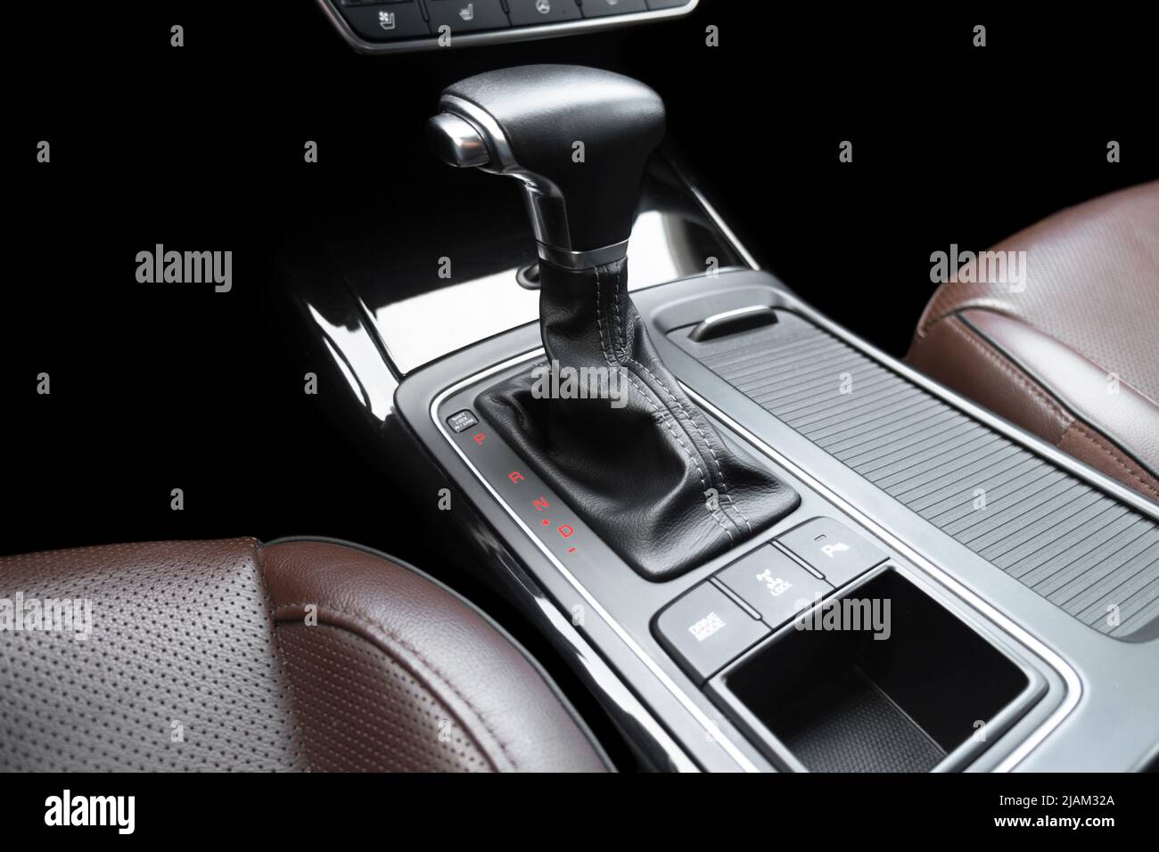 Automatic gear stick of a modern car. Modern car interior details ...