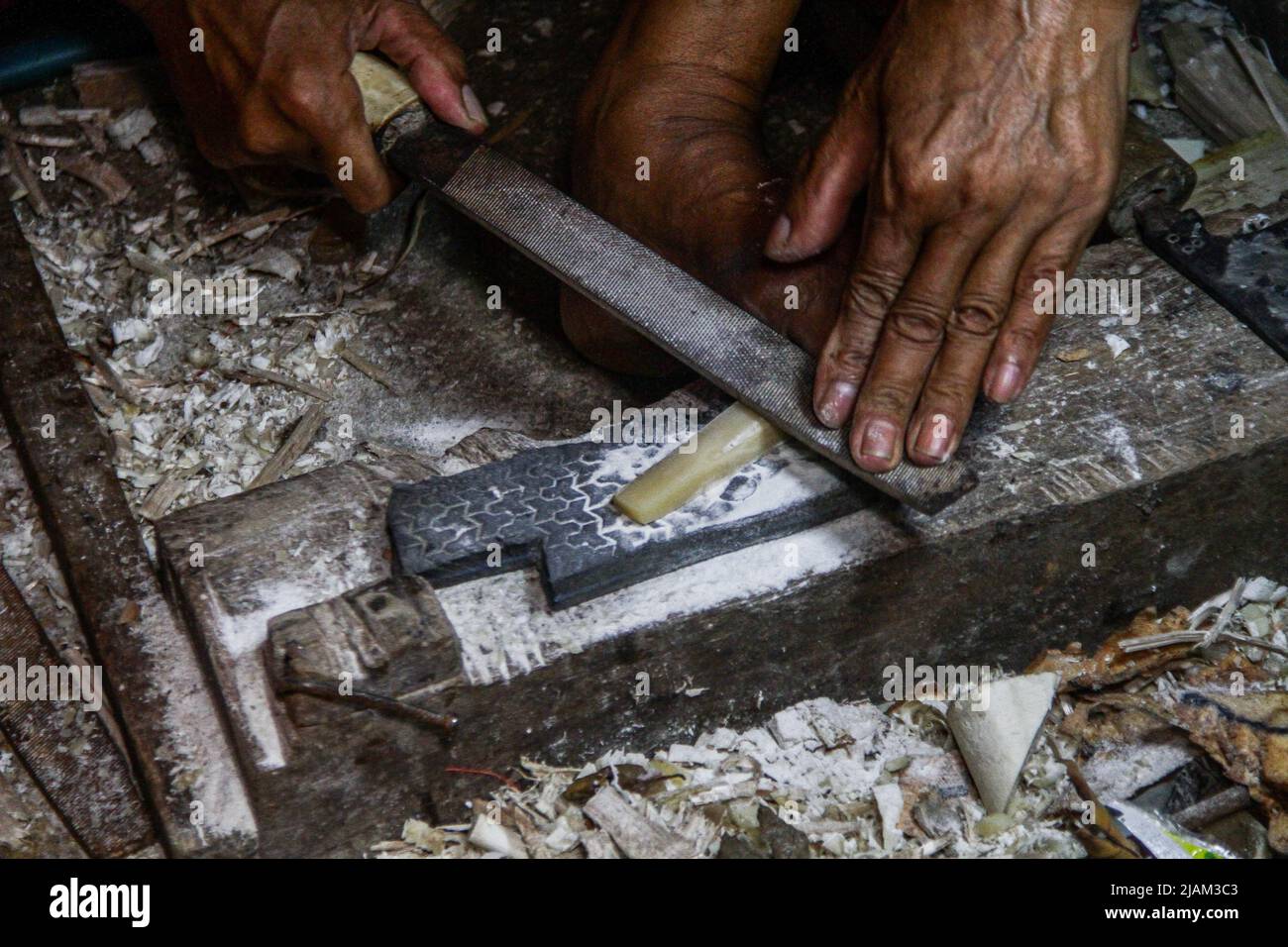 Cileunyi, Indonesia. 31st May, 2022. A man makes handicrafts of ...