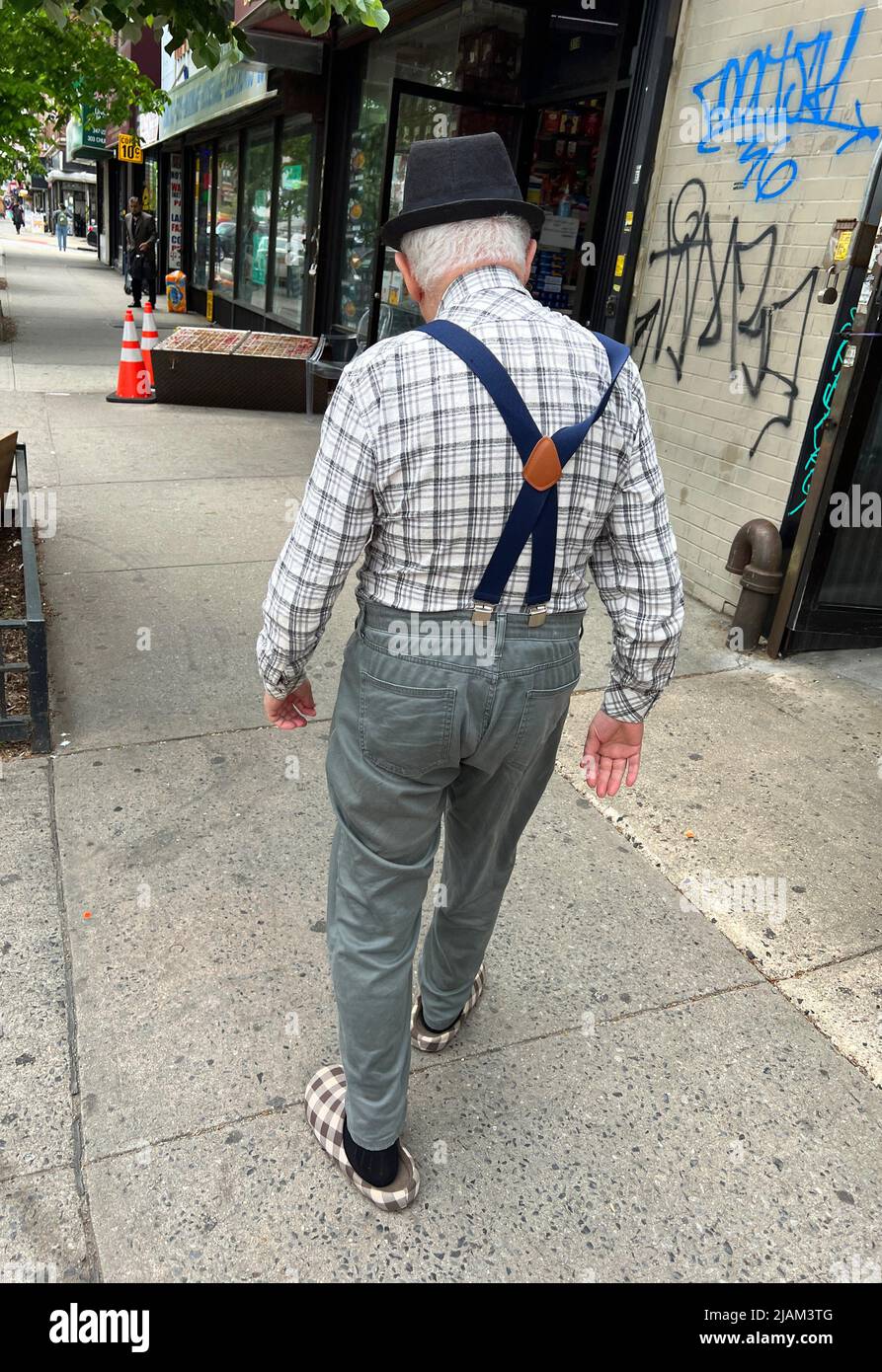 Older man with color coordinated shoes and shirt shuffle down the ...