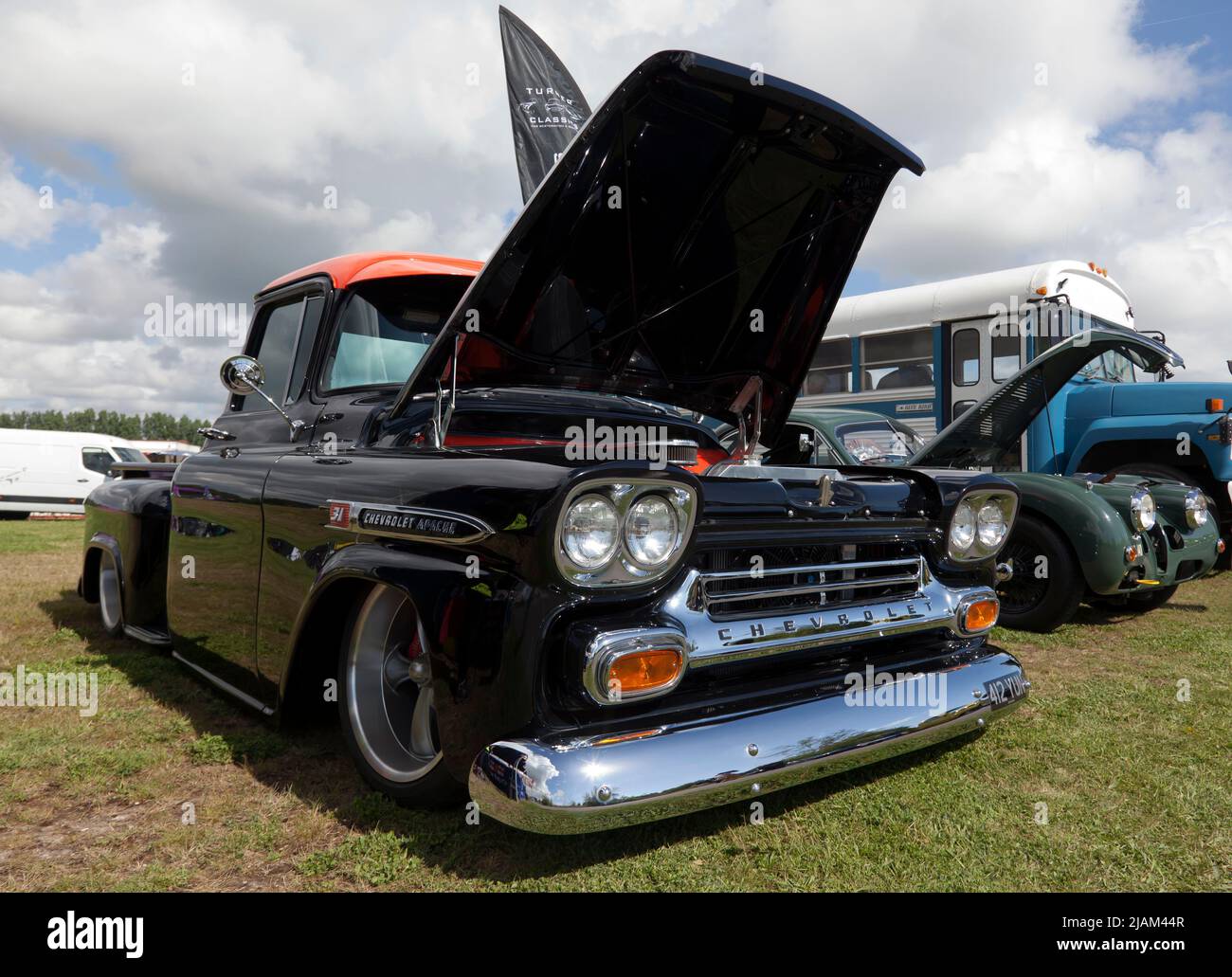 Three-quarters front view of a Hot Rod, based on a 1958, Chevrolet ...