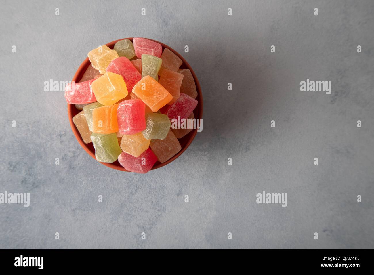 Traditional Turkish delight in bowls. Colorful Turkish delight on ...