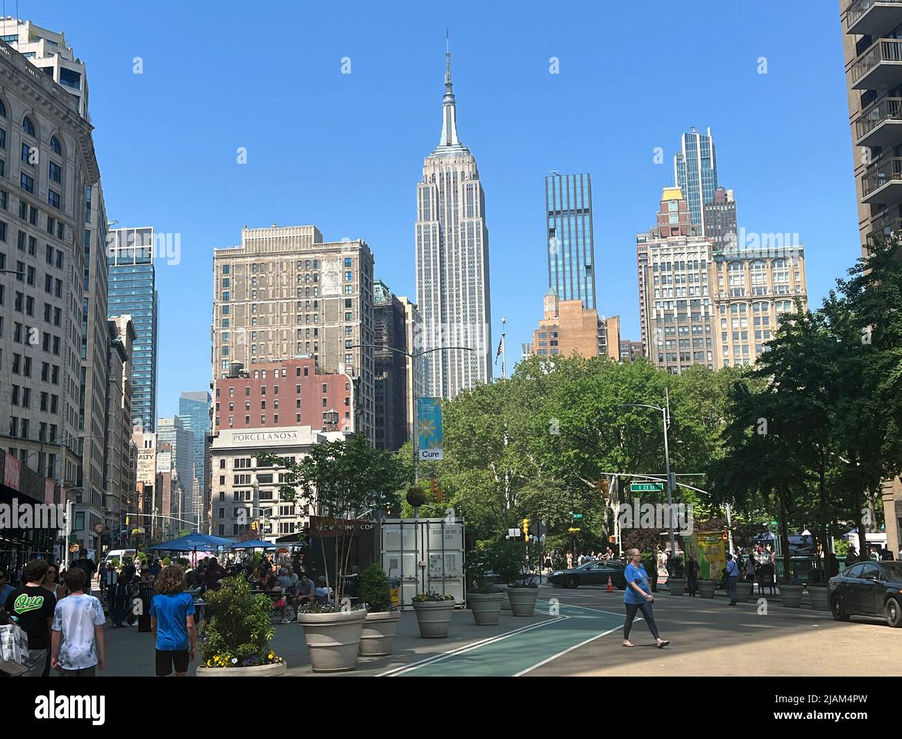View of the Empire State building amidst other structures from just ...