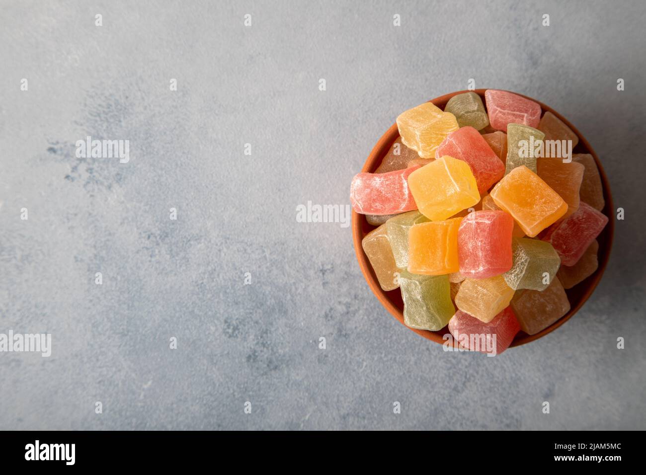 Traditional Turkish delight in bowls. Colorful Turkish delight on ...