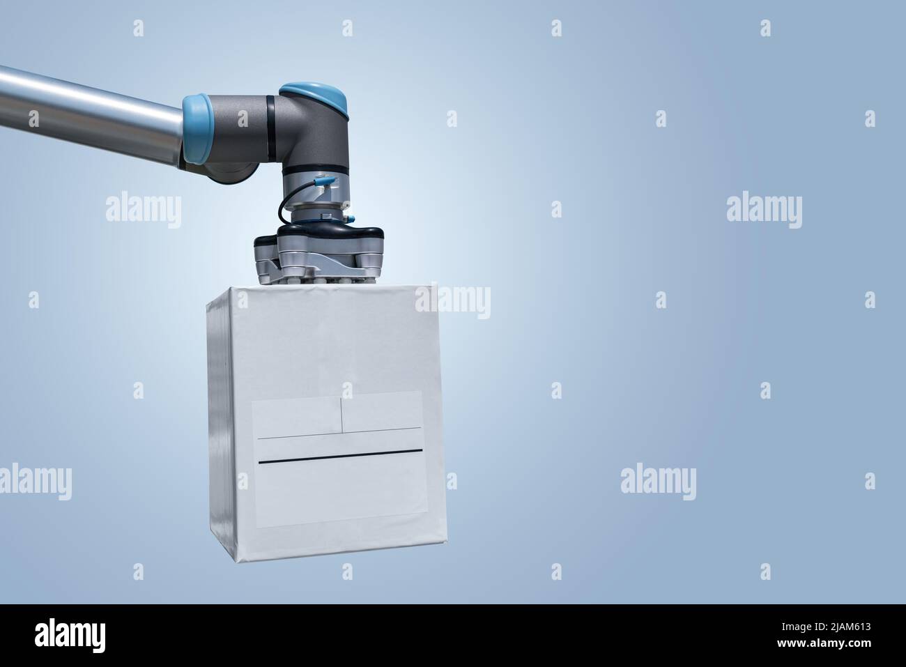 Robot arm with boxes on a gray background. Smart industry 4.0 concept ...